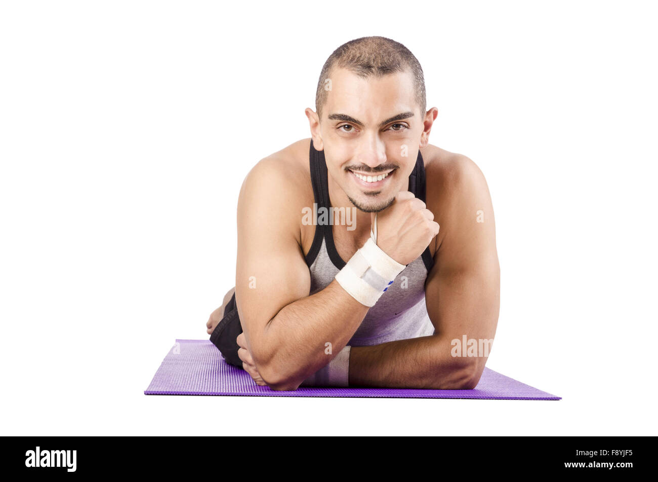 Man doing exercises on white Stock Photo - Alamy