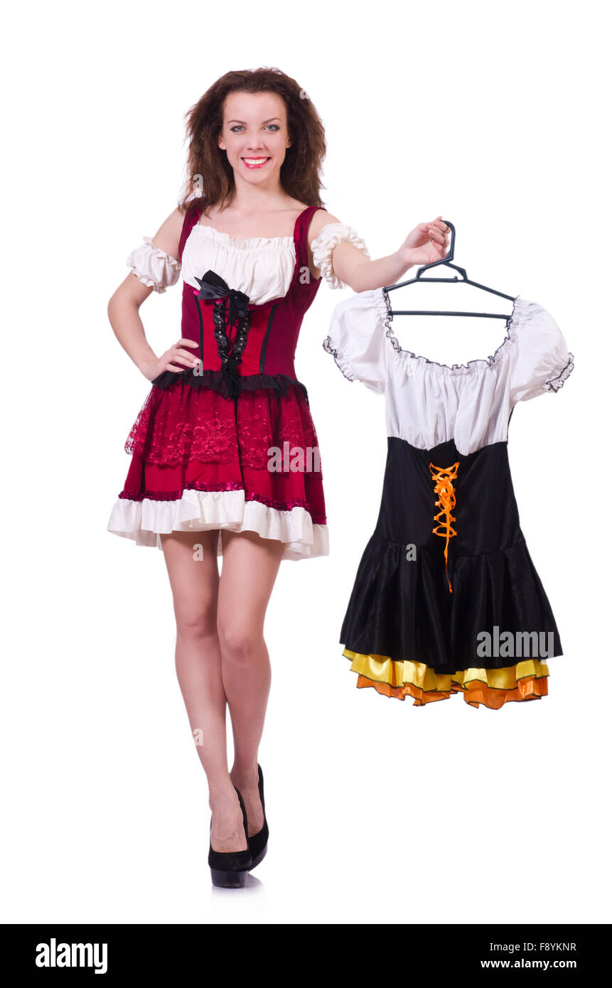 Woman trying to choose dress on white Stock Photo - Alamy