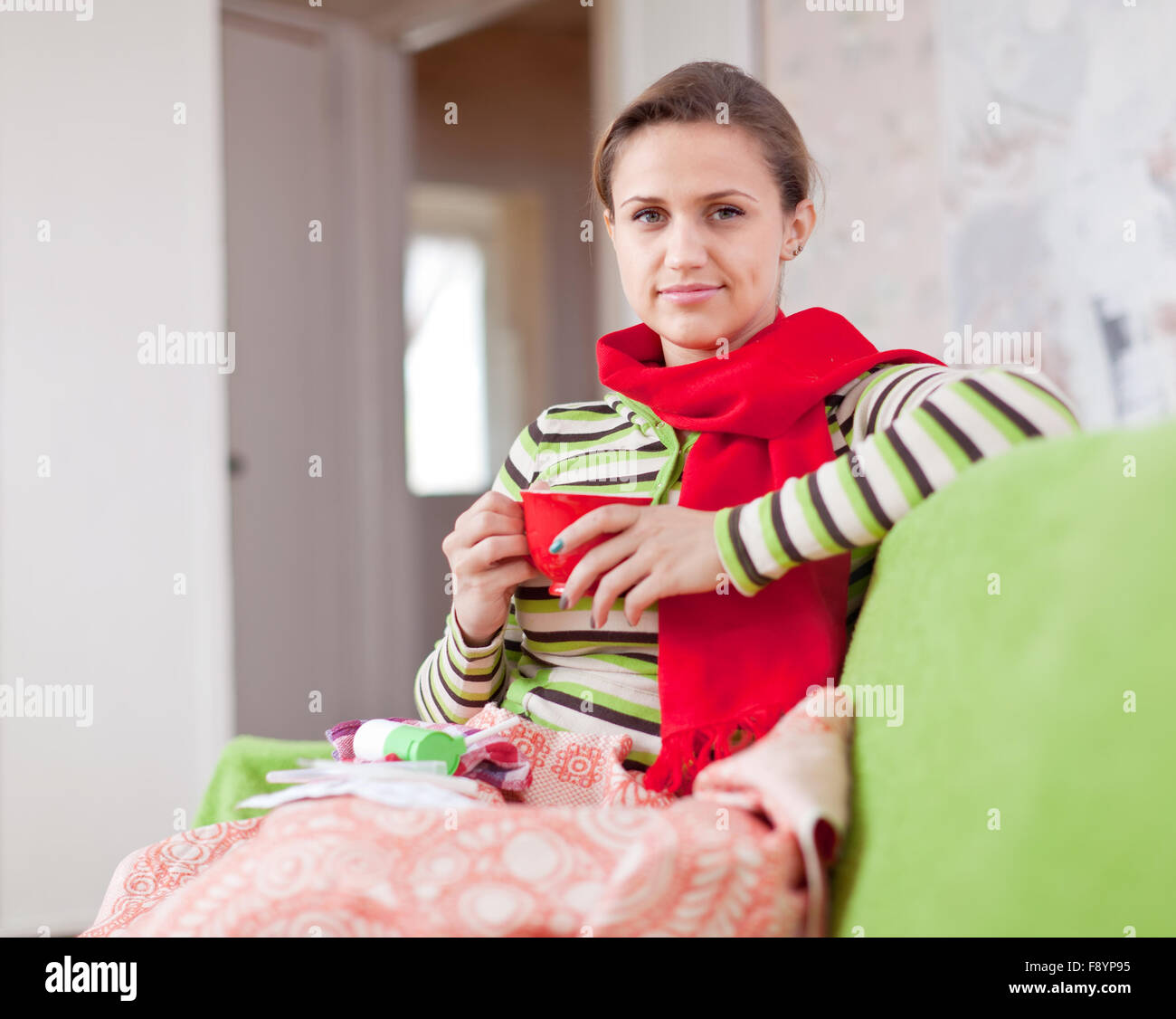 illness woman in warm scarf with hot cup Stock Photo - Alamy