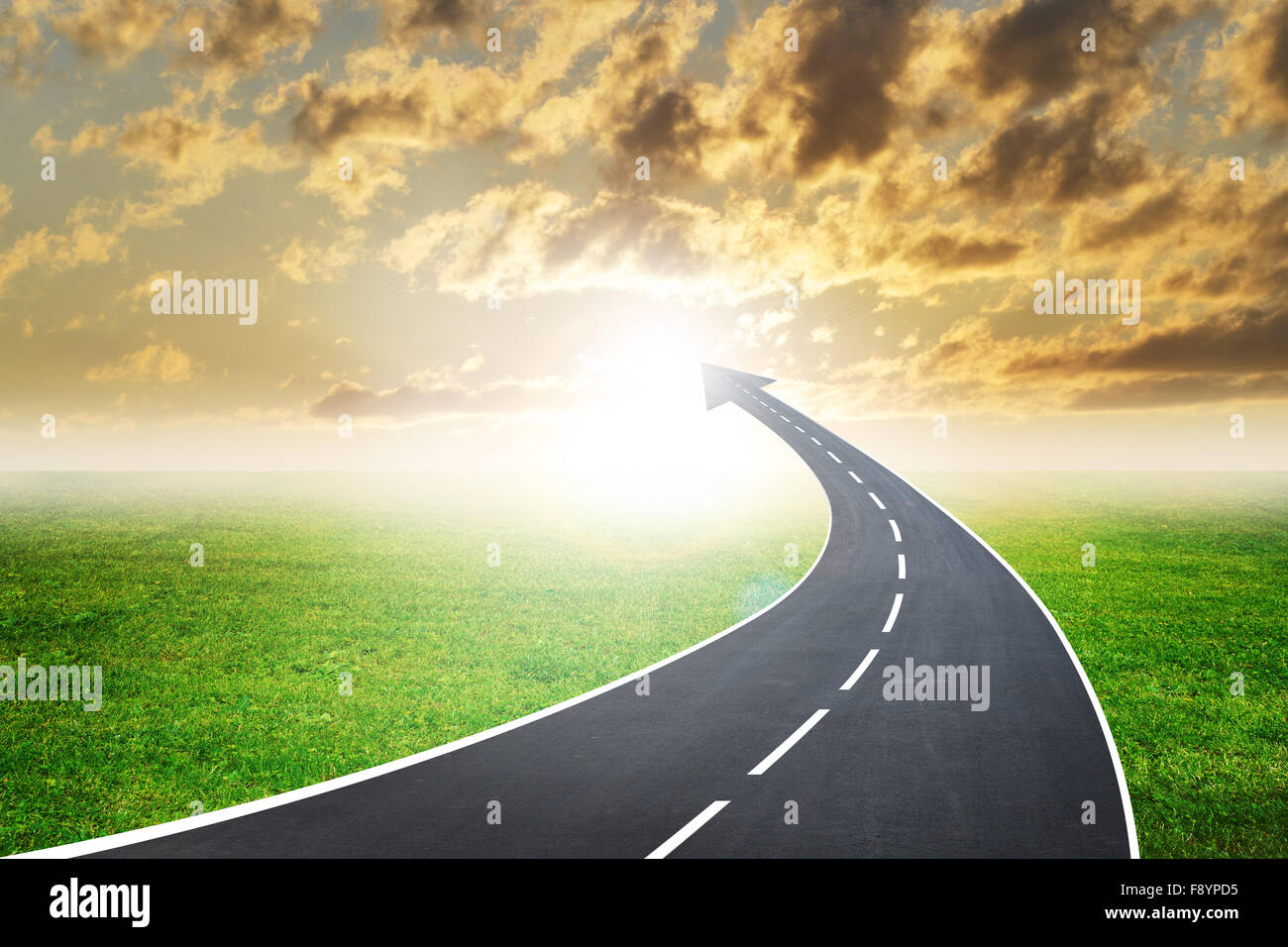 Highway road going up as an arrow in sunset Stock Photo - Alamy