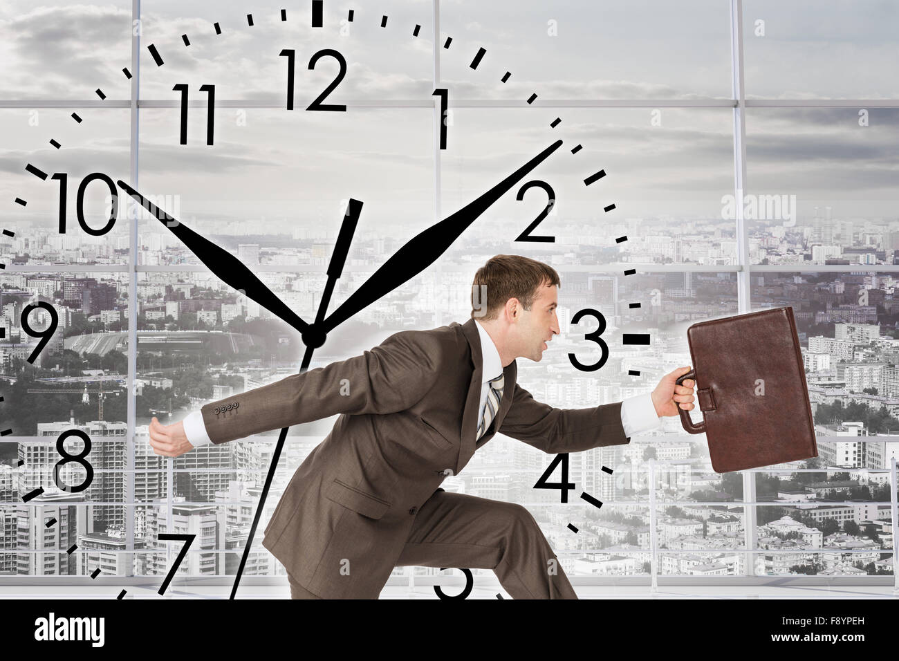 Businessman running with clock background Stock Photo - Alamy
