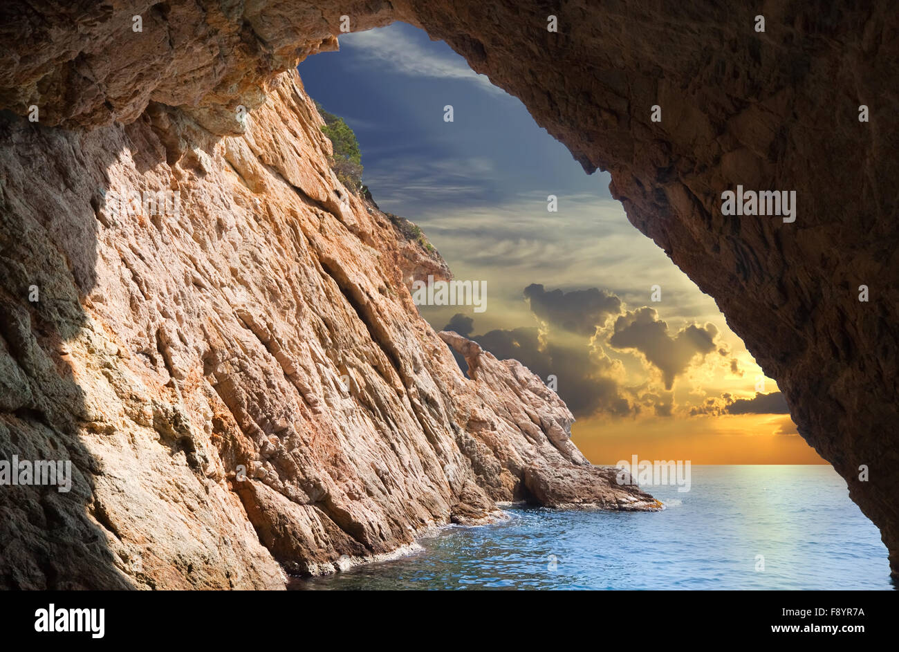 Inside view of cave in rising. Nature composition Stock Photo - Alamy