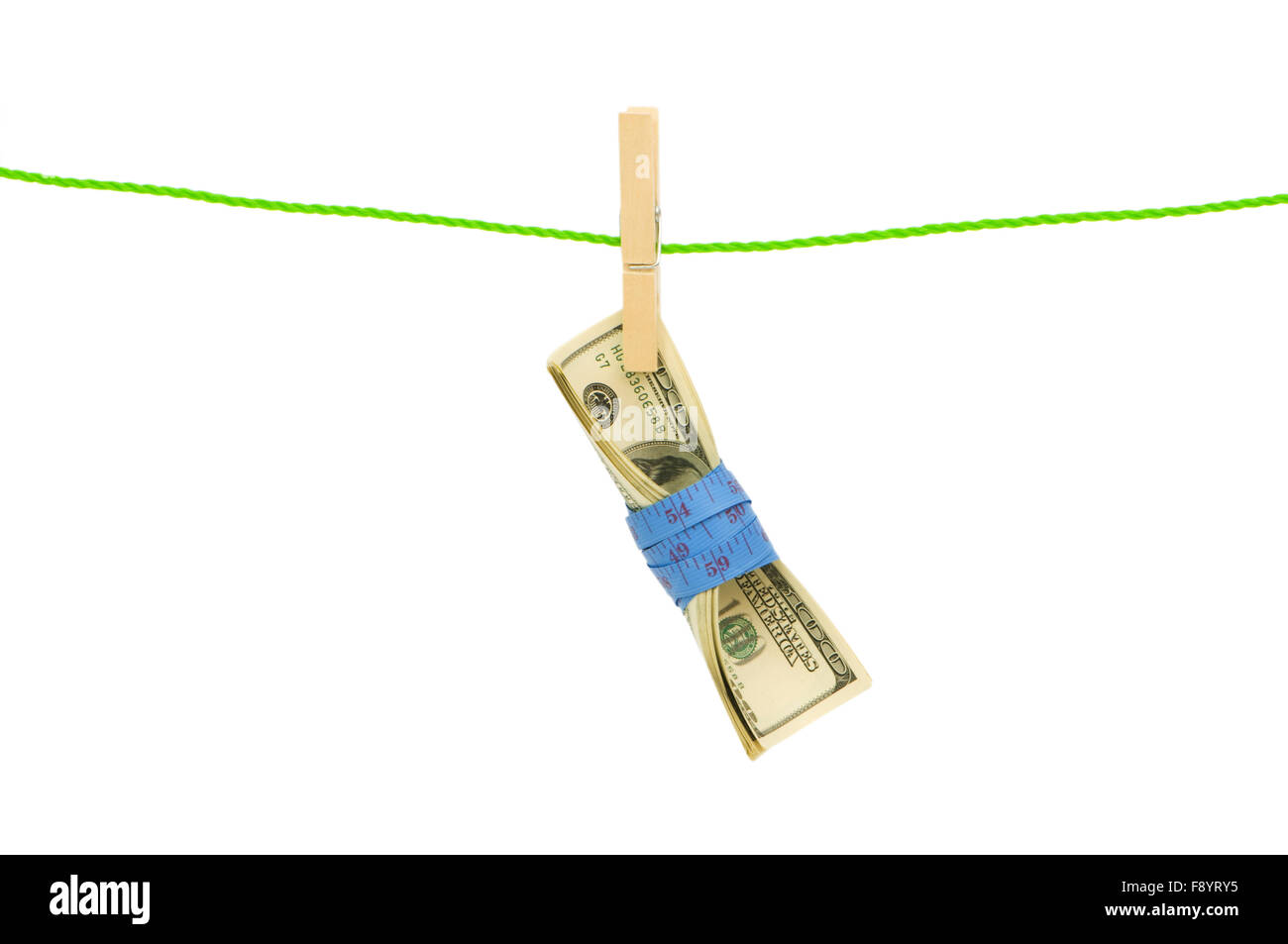 Money laundering concept with dollars on the rope Stock Photo - Alamy