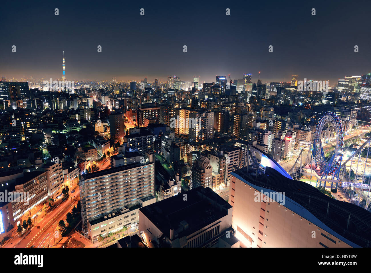 Tokyo Skytree and urban skyline rooftop view at night, Japan Stock ...