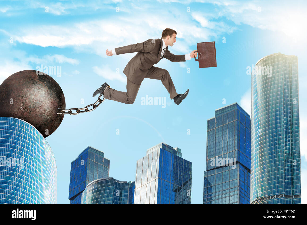 Man jumping over gap Stock Photo - Alamy