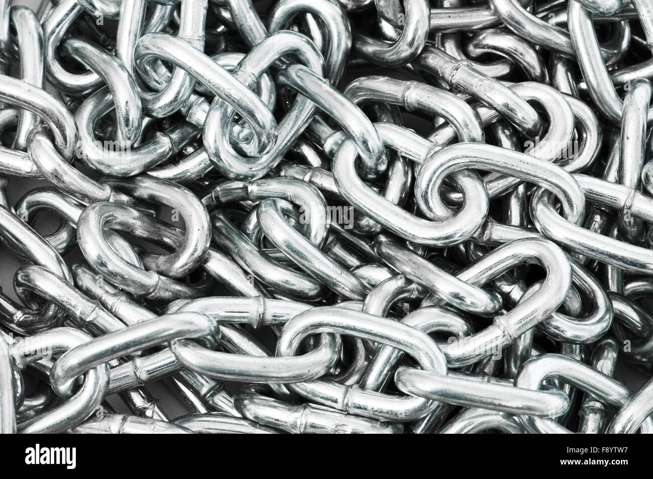 Long silver chain arranged as the background Stock Photo - Alamy