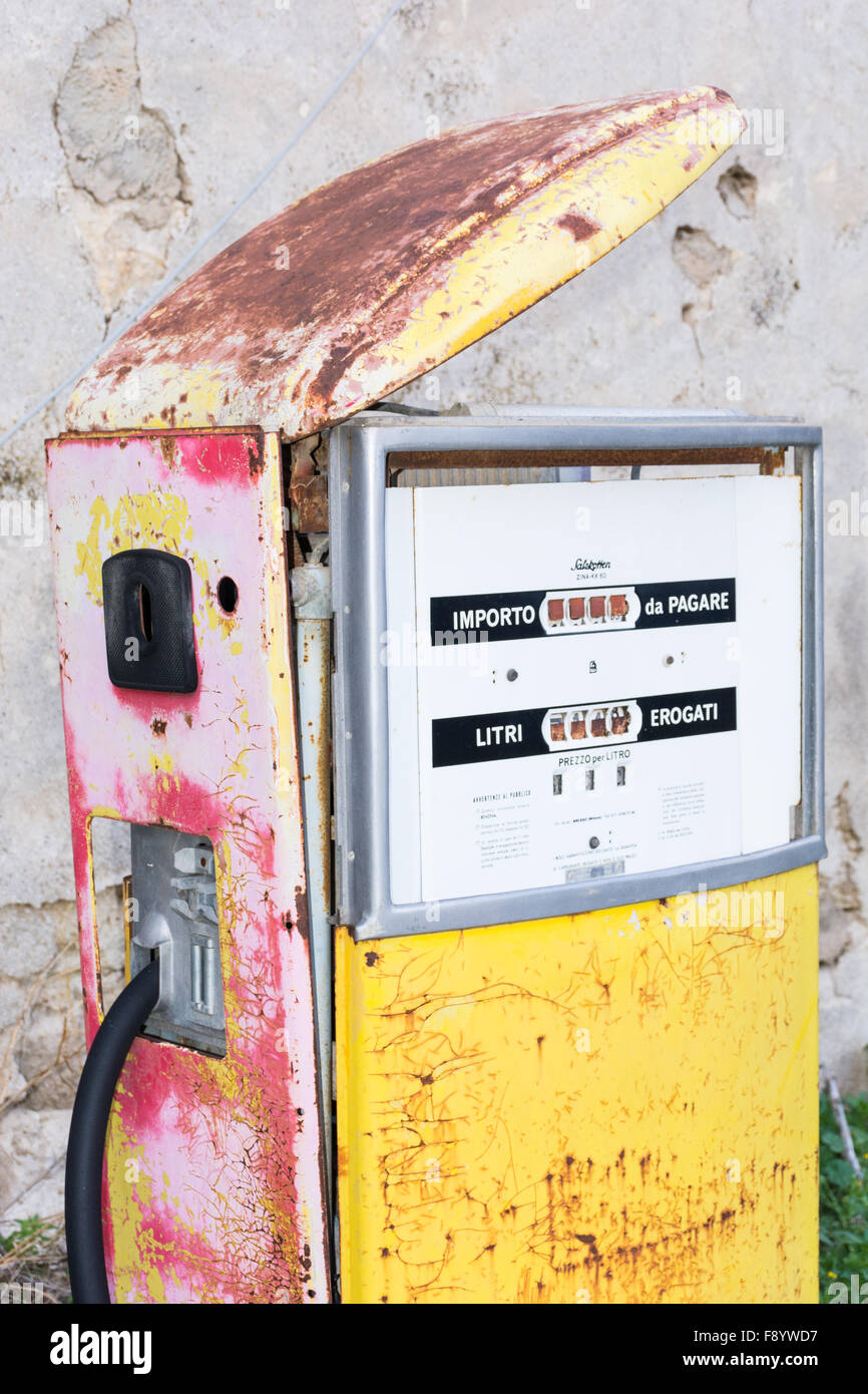 Distributor or gas pump, abandoned. Isolated, old and rusty in a war ...
