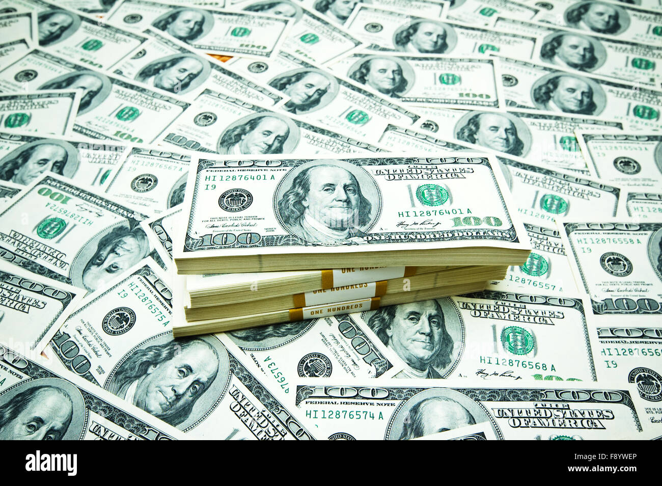 Stack of dollars on money background Stock Photo - Alamy
