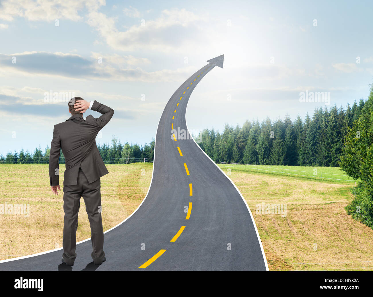 Person standing on roadway going up as arrow Stock Photo - Alamy