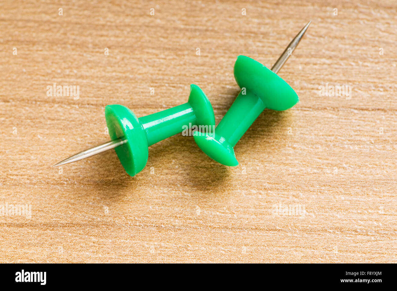 Many colourful office pins on the background Stock Photo - Alamy