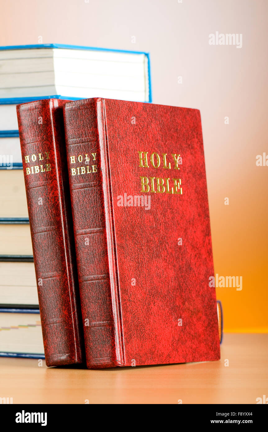Bible books against the colorful gradient background Stock Photo - Alamy