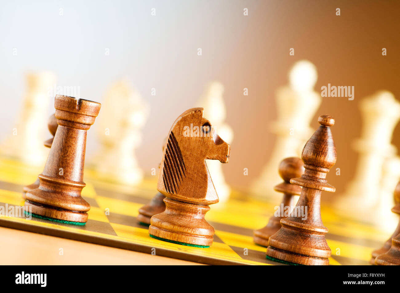 Set of chess figures on the playing board Stock Photo - Alamy