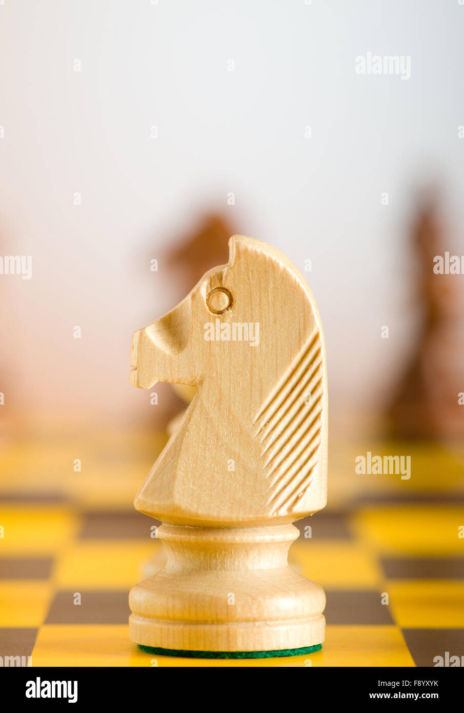 Set of chess figures on the playing board Stock Photo - Alamy