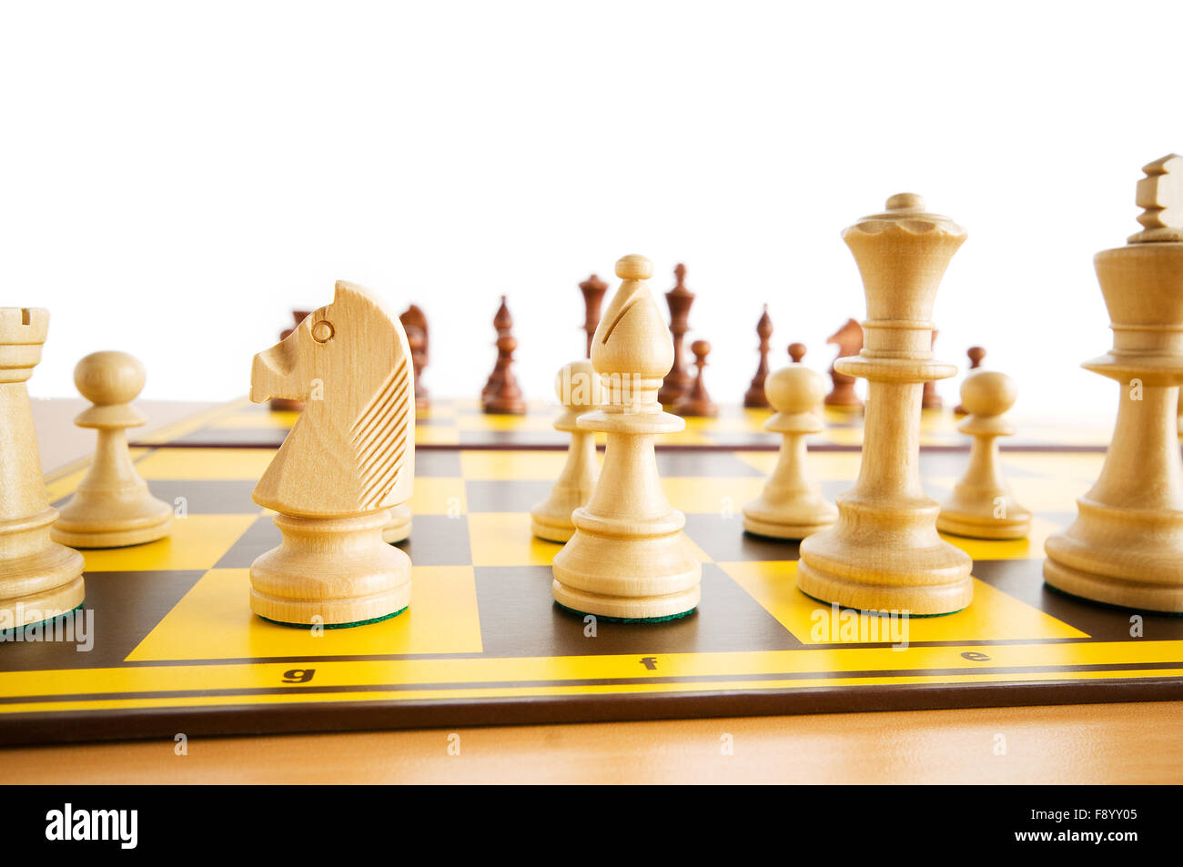 Set of chess figures on the playing board Stock Photo - Alamy