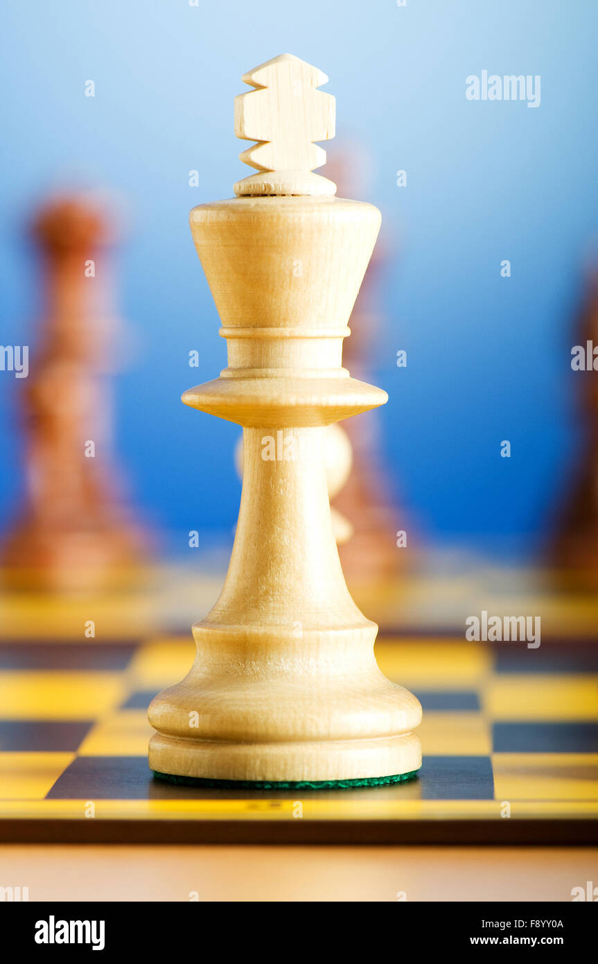 Set of chess figures on the playing board Stock Photo - Alamy
