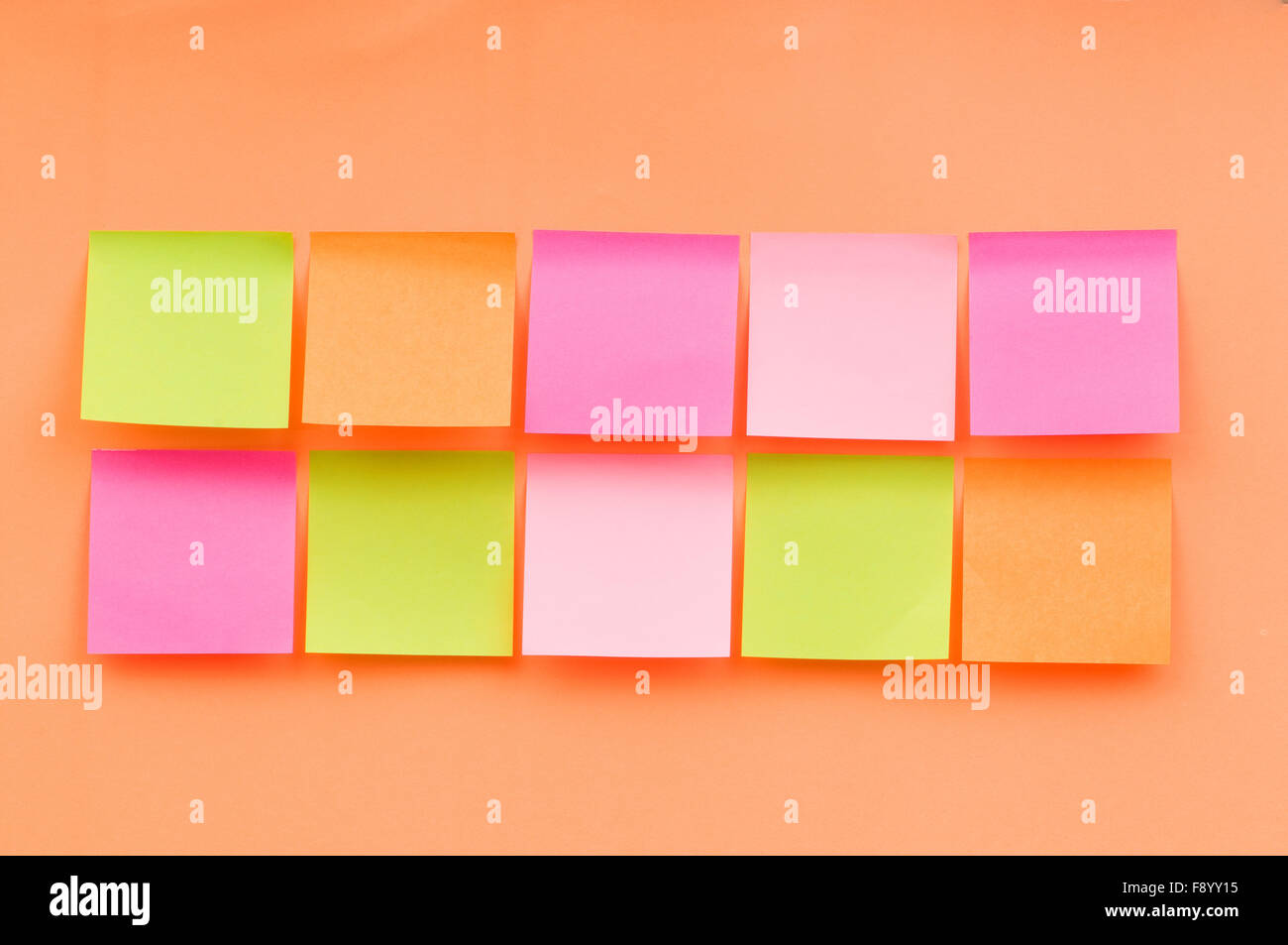 Reminder notes on the bright colorful paper Stock Photo - Alamy