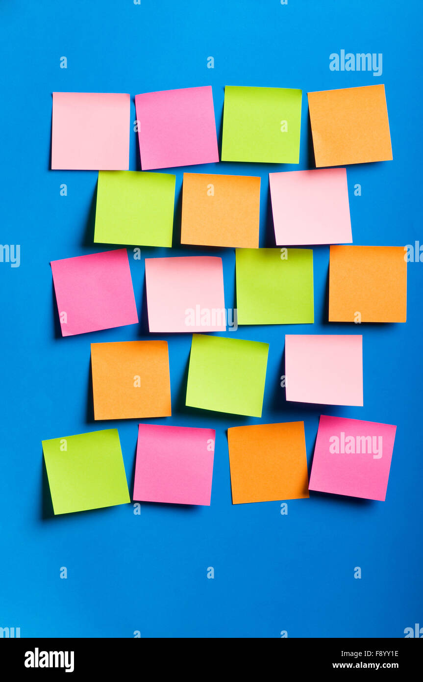 Reminder notes on the bright colorful paper Stock Photo - Alamy