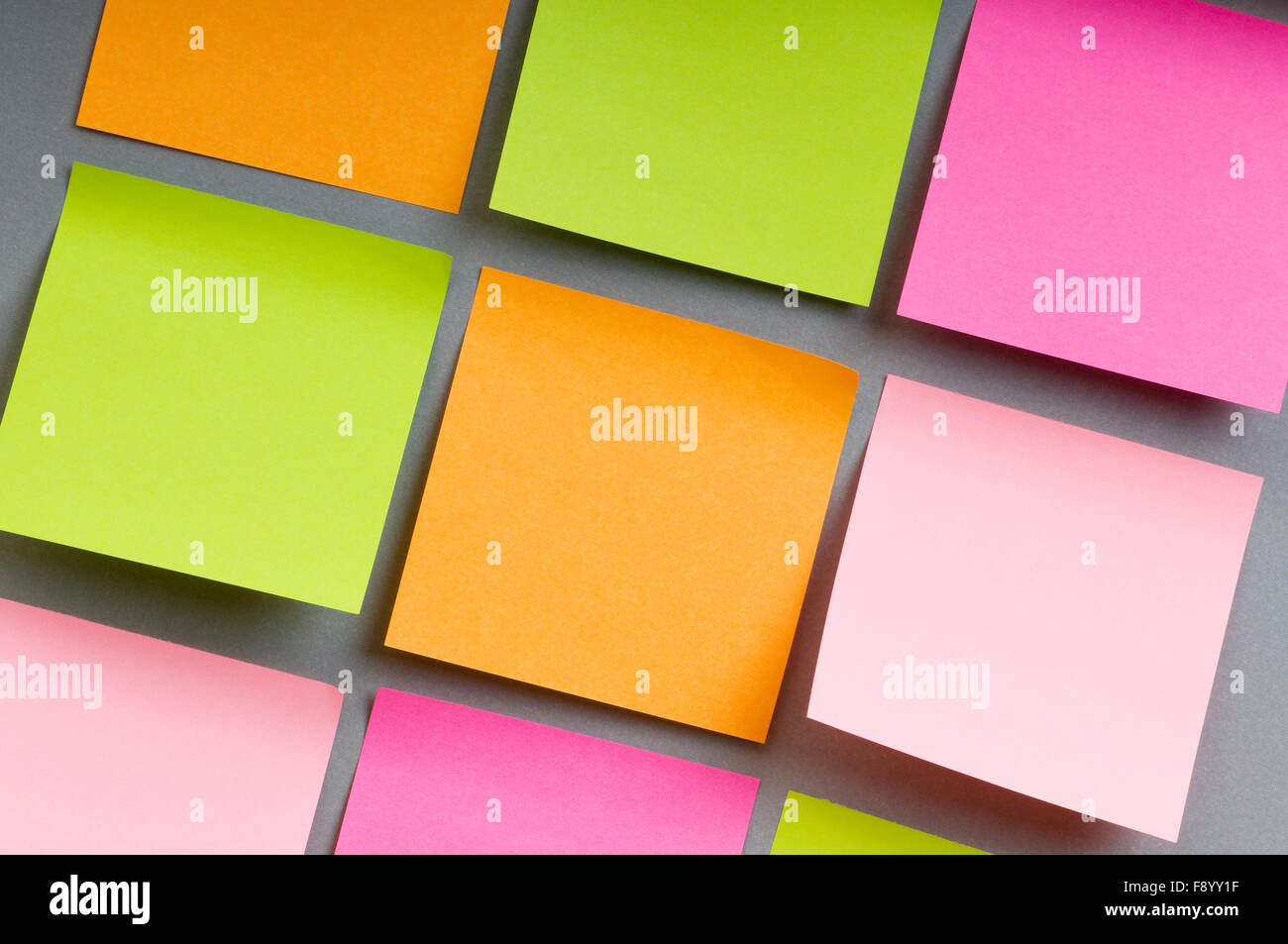 Reminder notes on the bright colorful paper Stock Photo - Alamy