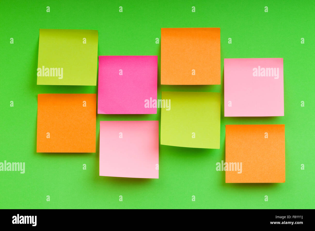 Reminder notes on the bright colorful paper Stock Photo - Alamy