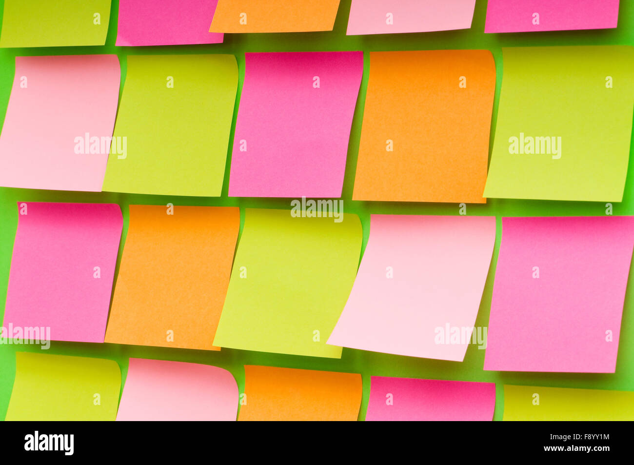Reminder notes on the bright colorful paper Stock Photo - Alamy