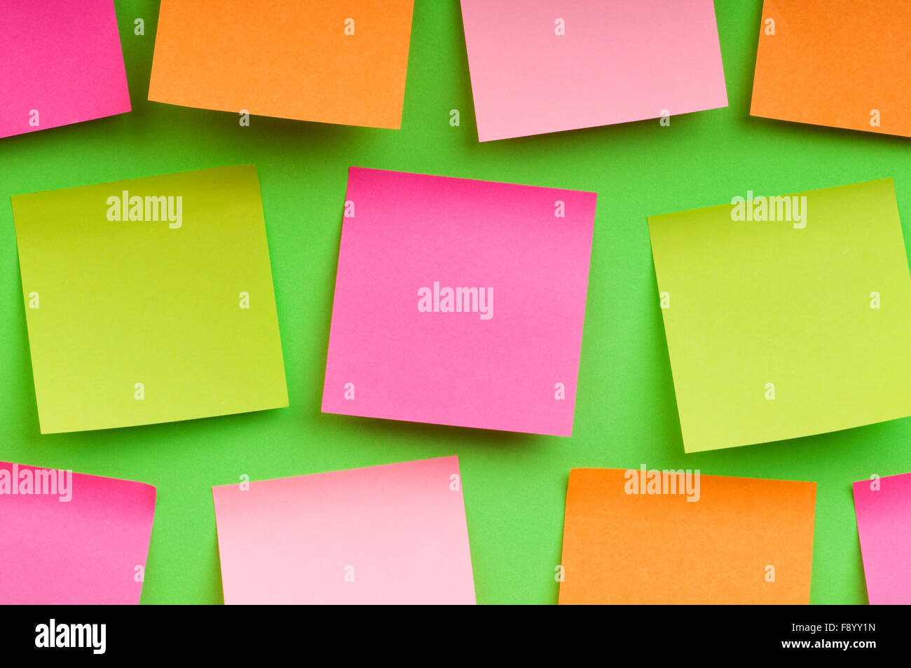 Reminder notes on the bright colorful paper Stock Photo - Alamy