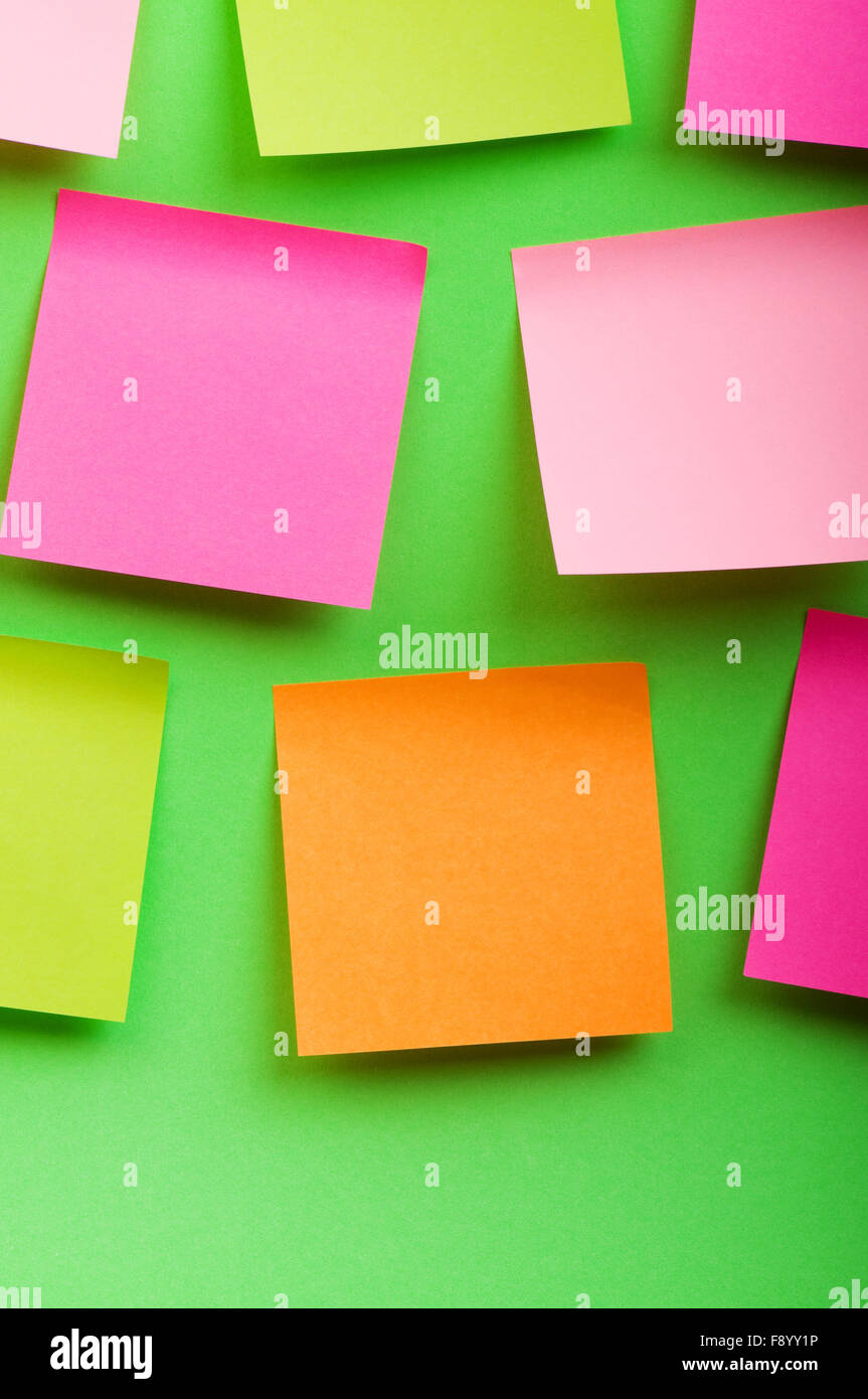 Reminder notes on the bright colorful paper Stock Photo - Alamy