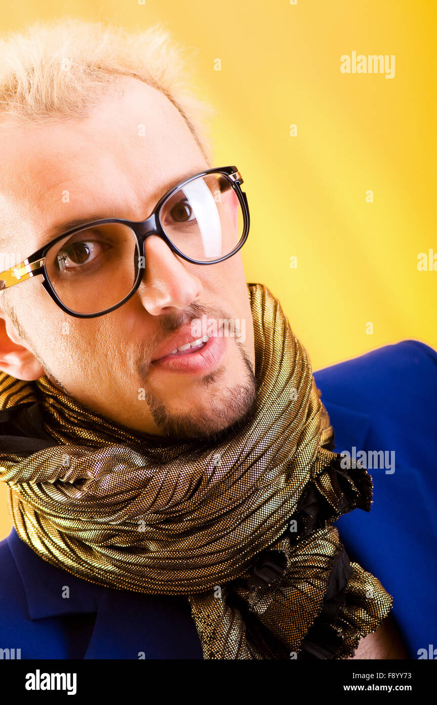 Man with blue jacket in studio shooting Stock Photo - Alamy