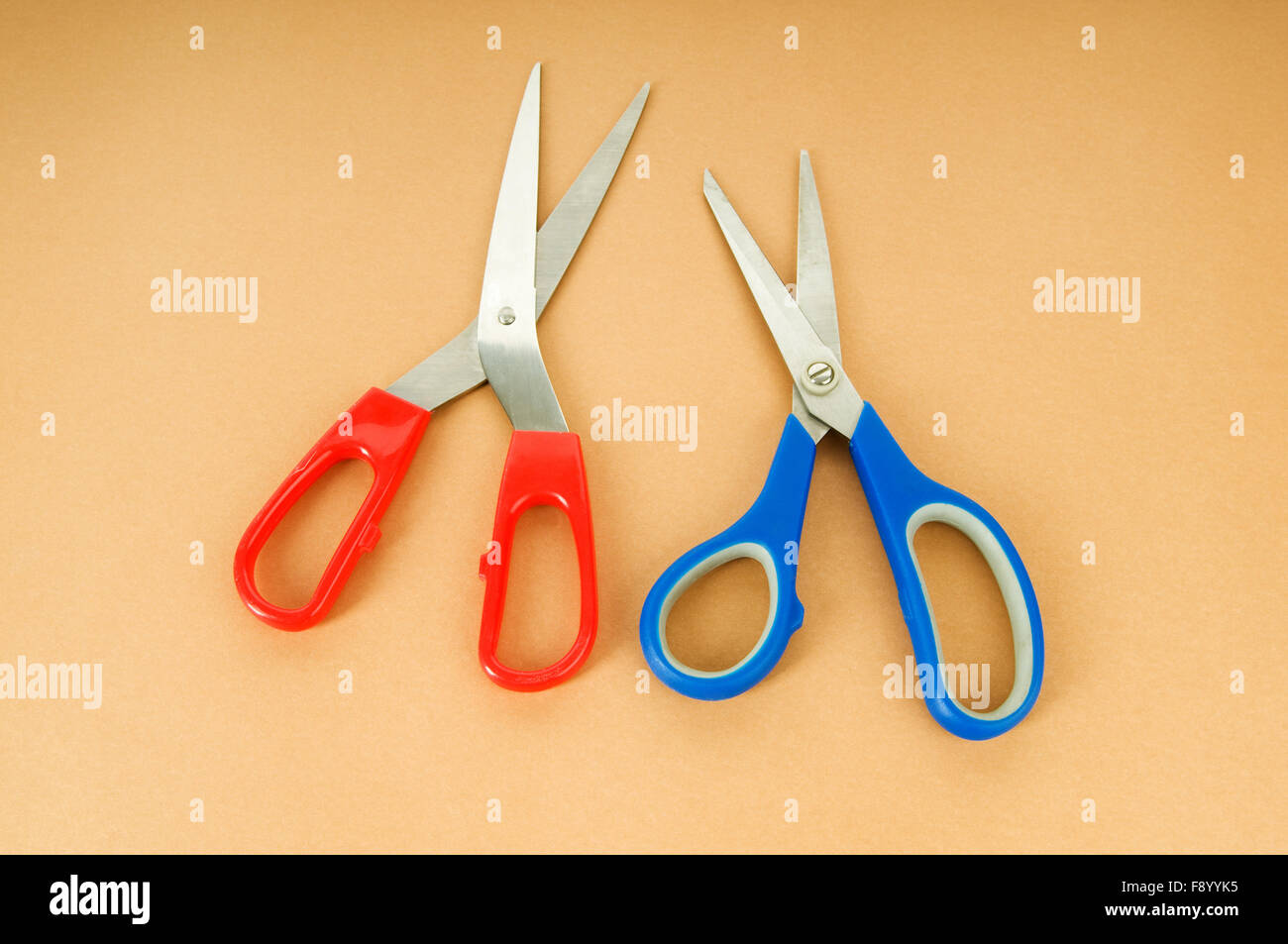 Colorful scissors on the color paper background Stock Photo - Alamy