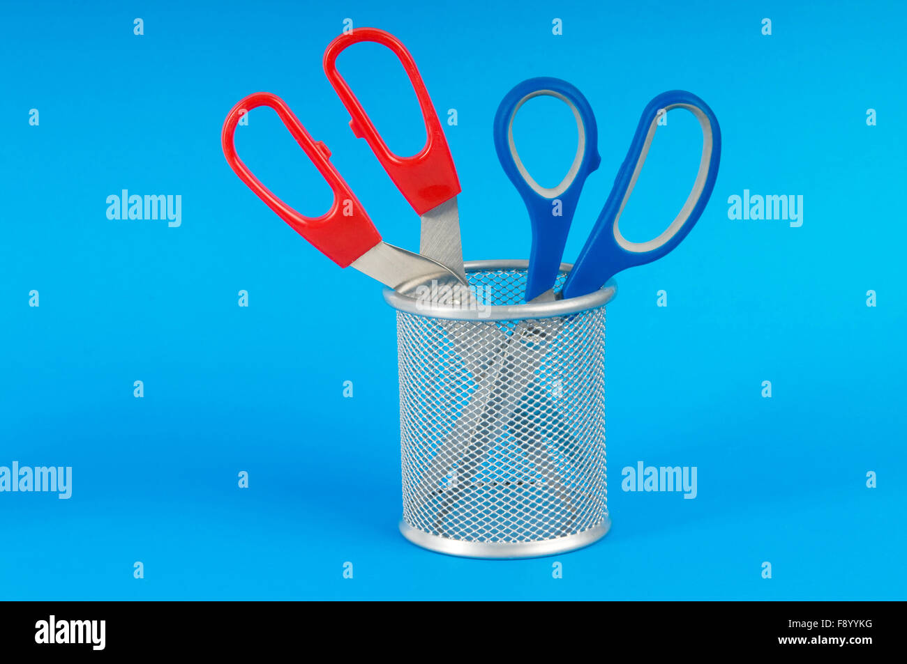 Colorful scissors on the color paper background Stock Photo - Alamy