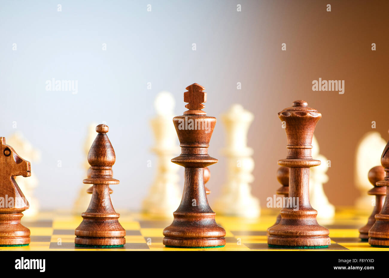 Set of chess figures on the playing board Stock Photo - Alamy
