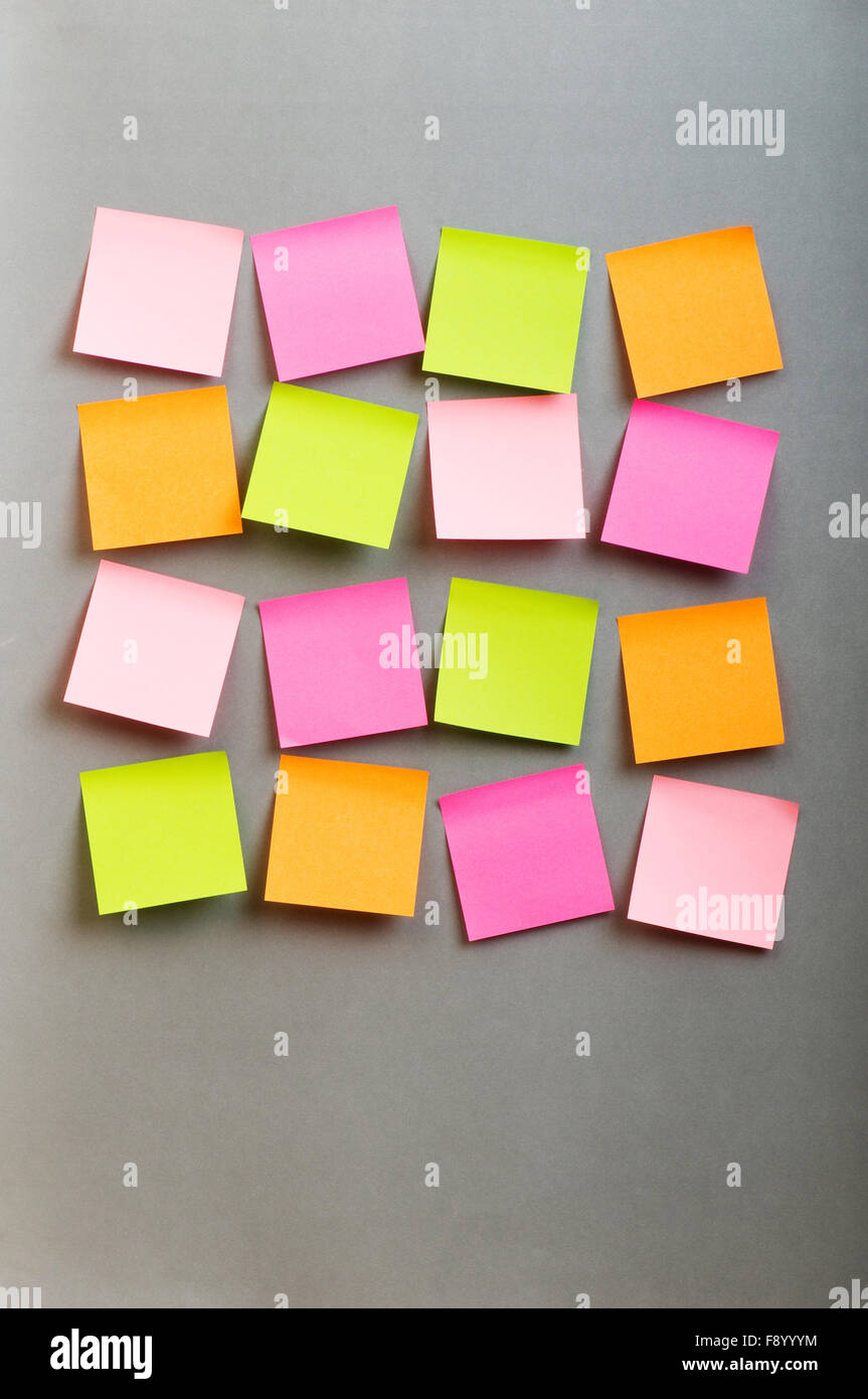 Reminder notes on the bright colorful paper Stock Photo - Alamy