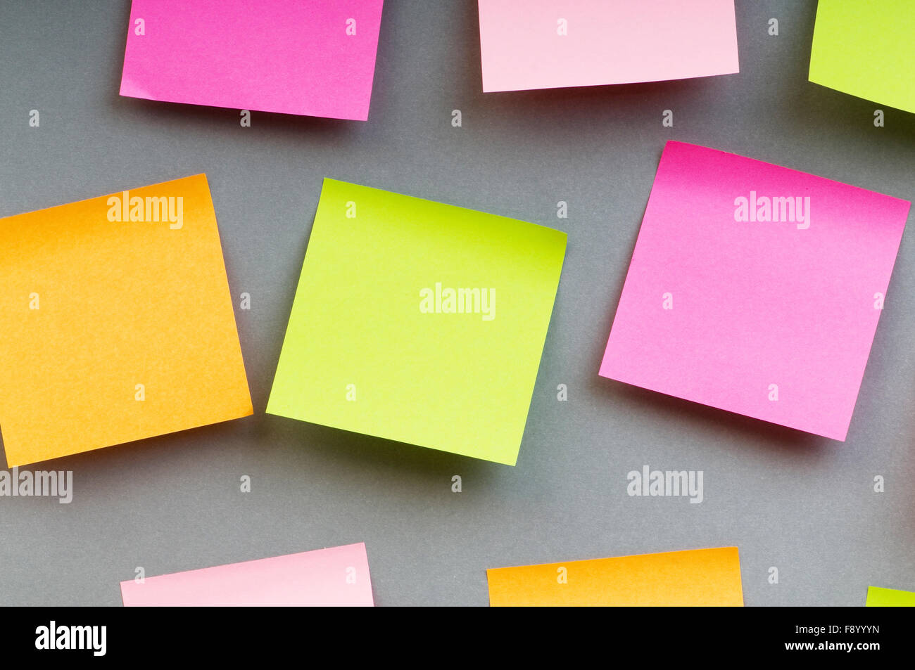 Reminder notes on the bright colorful paper Stock Photo - Alamy