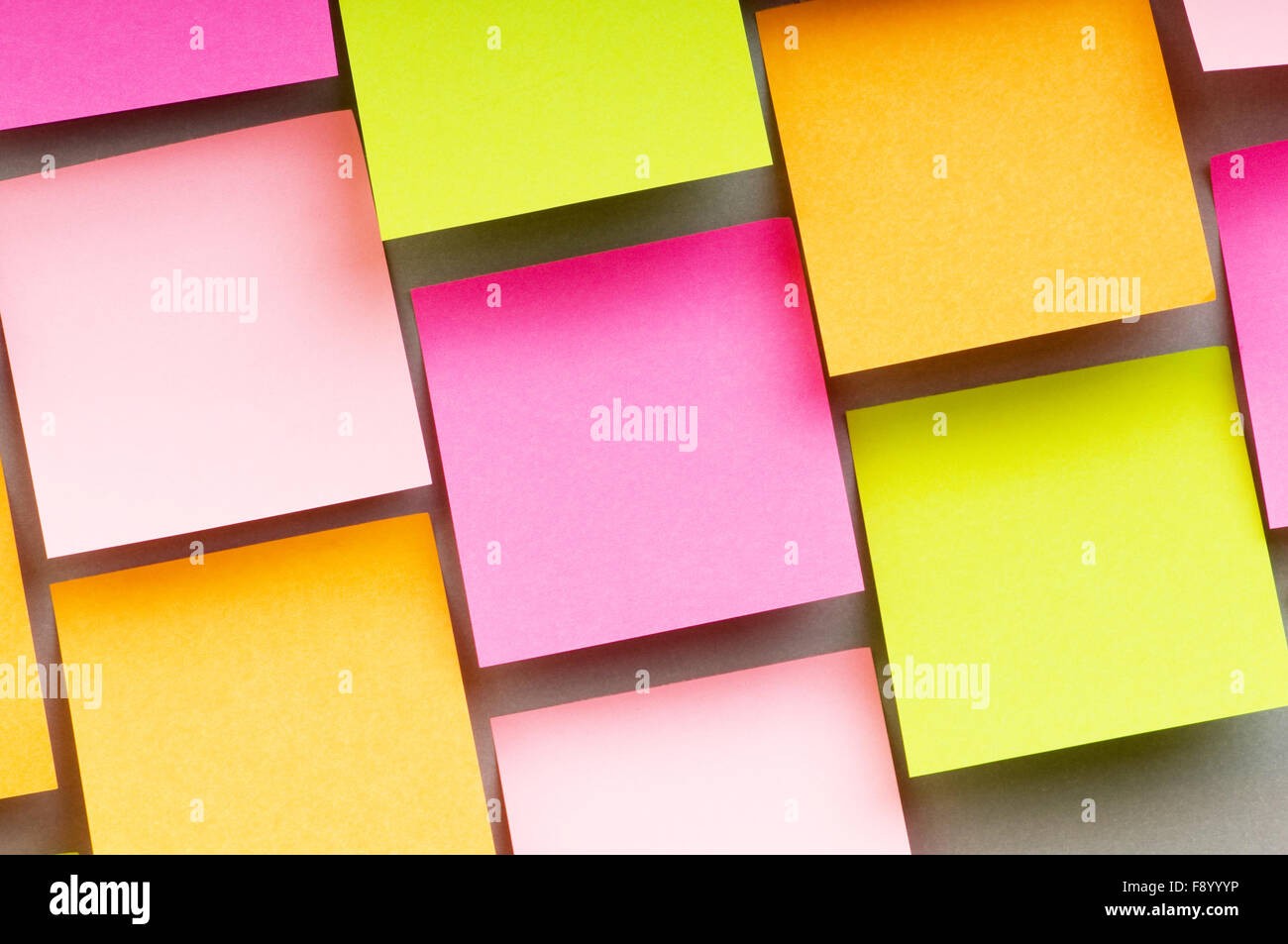 Reminder notes on the bright colorful paper Stock Photo - Alamy