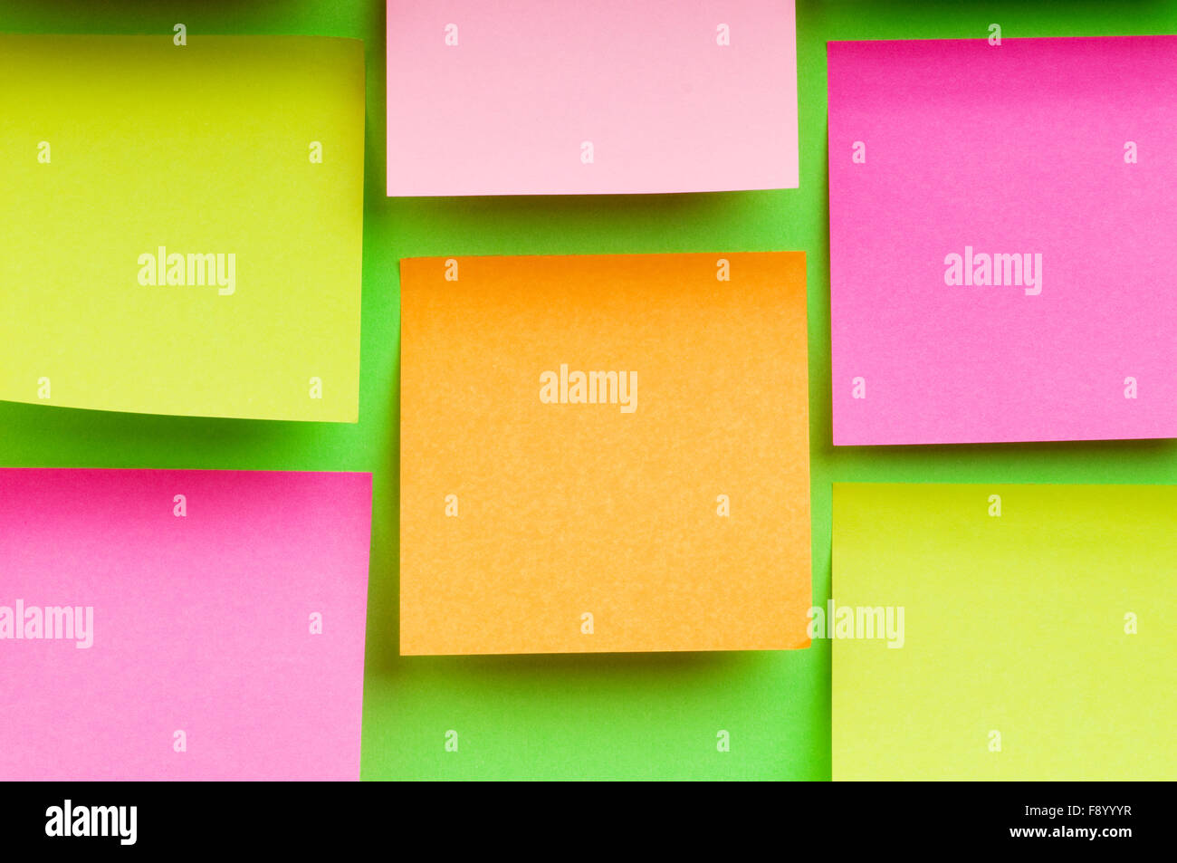 Reminder notes on the bright colorful paper Stock Photo - Alamy