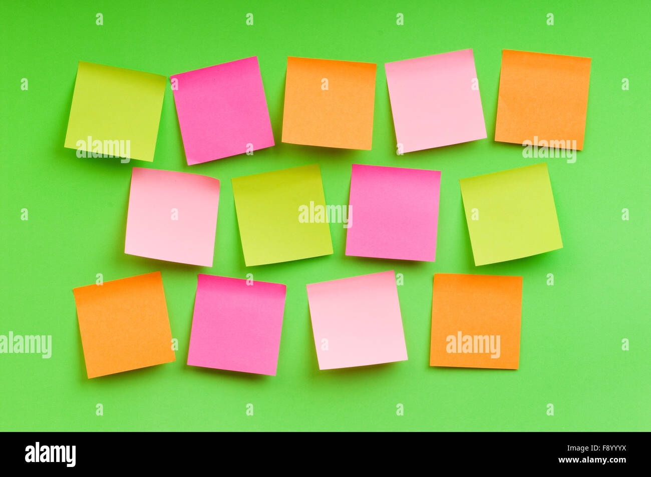 Reminder notes on the bright colorful paper Stock Photo - Alamy