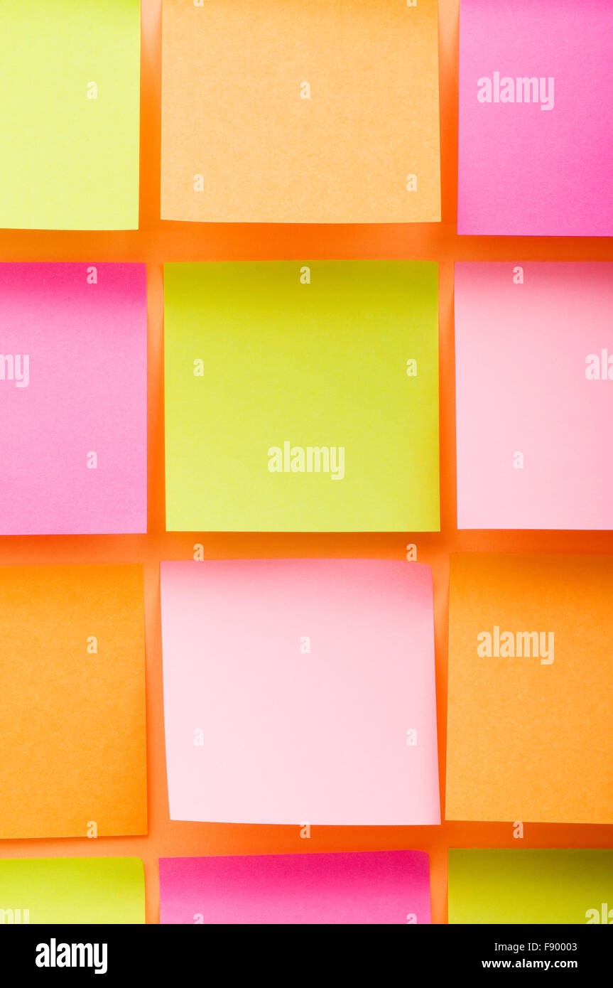 Reminder notes on the bright colorful paper Stock Photo - Alamy