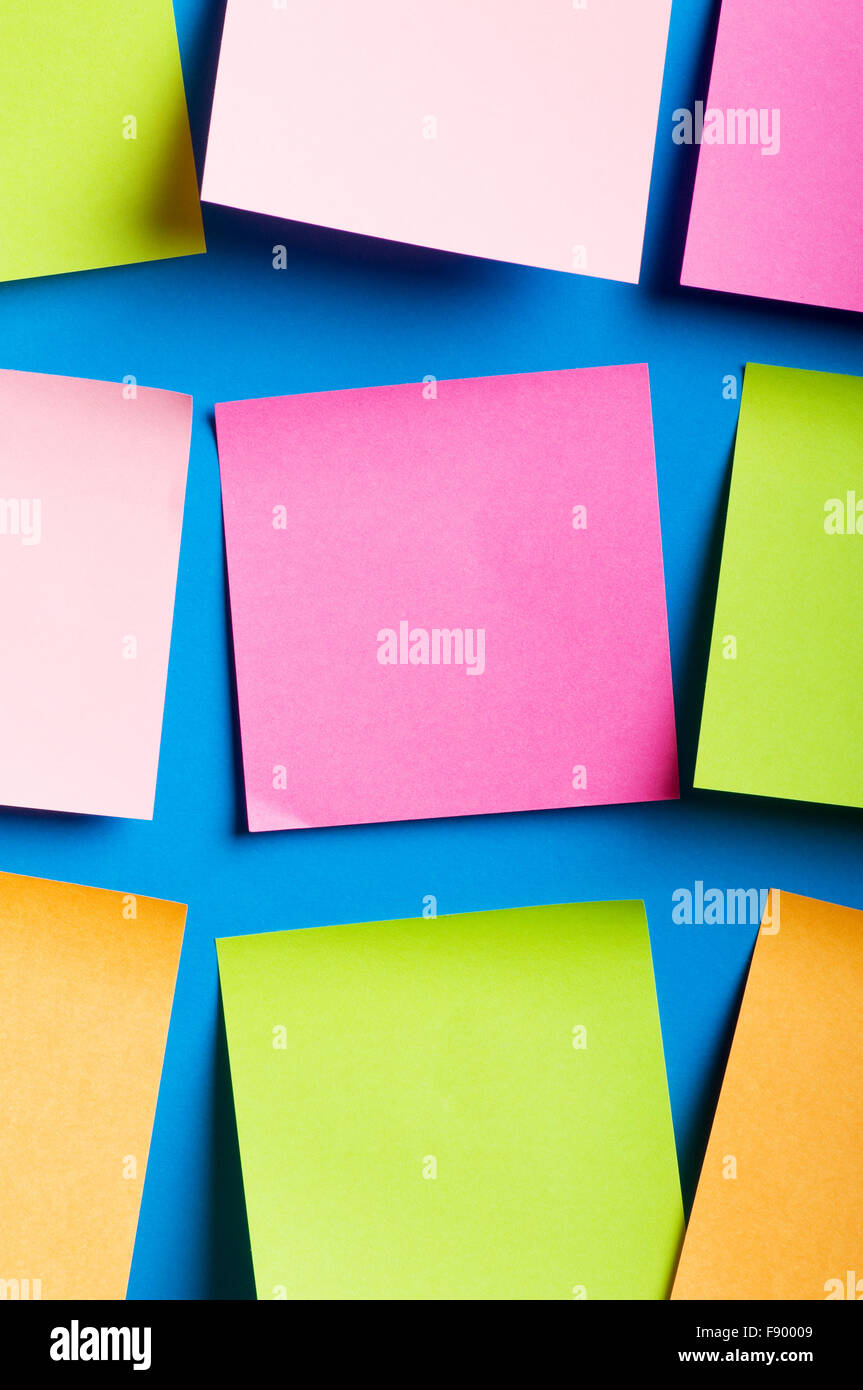 Reminder notes on the bright colorful paper Stock Photo - Alamy