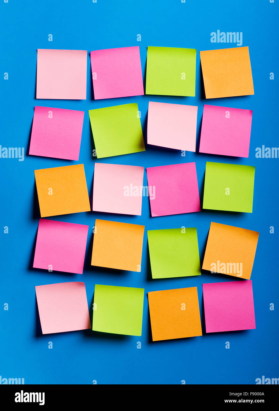 Reminder notes on the bright colorful paper Stock Photo - Alamy