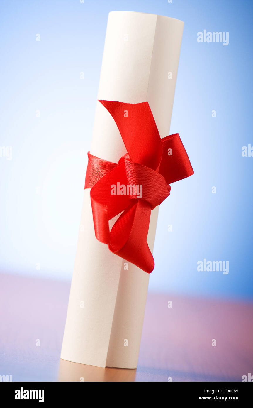 Education concept - diploma roll on the wooden table Stock Photo - Alamy