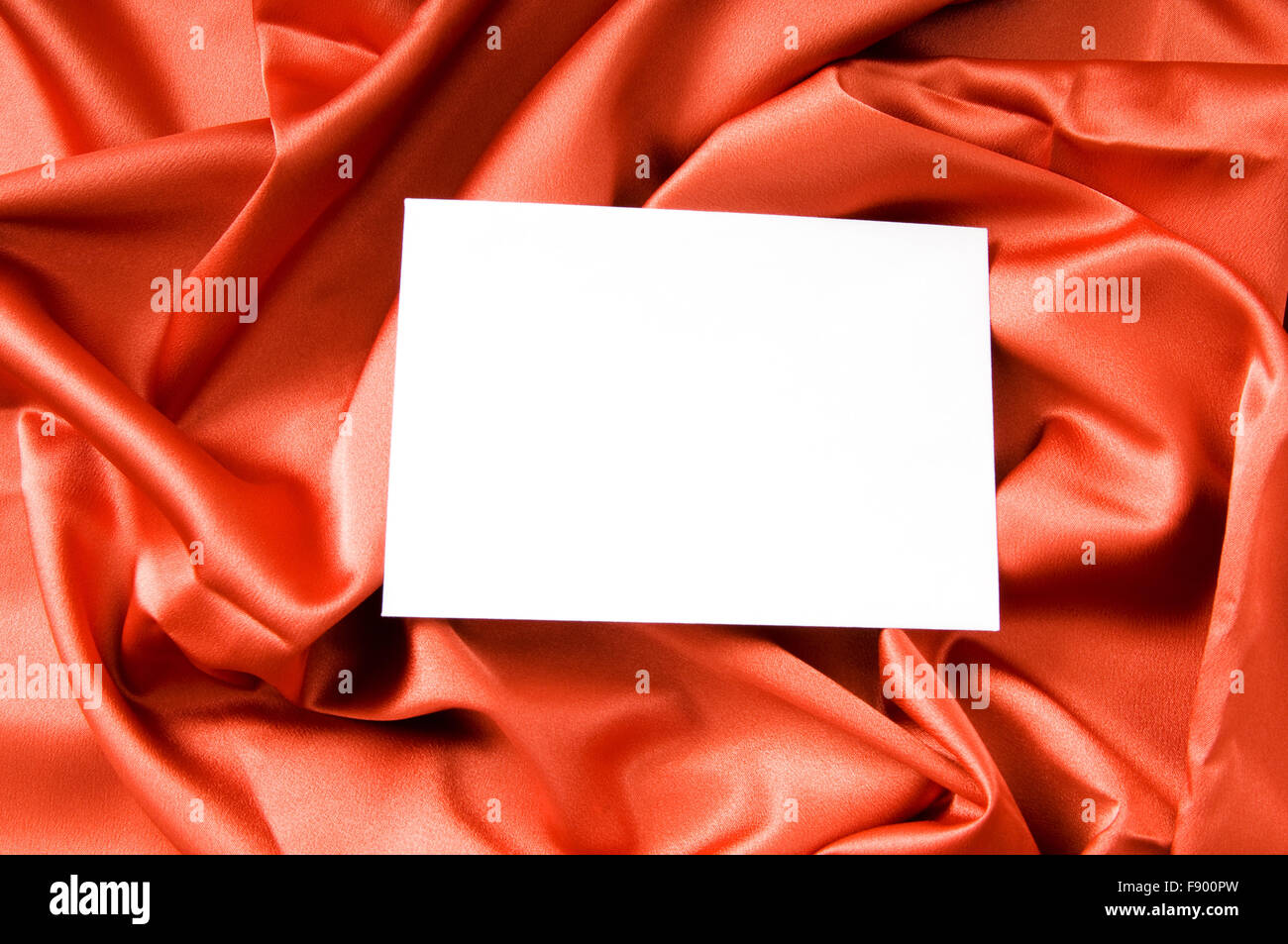 Blank message on the red satin background Stock Photo - Alamy