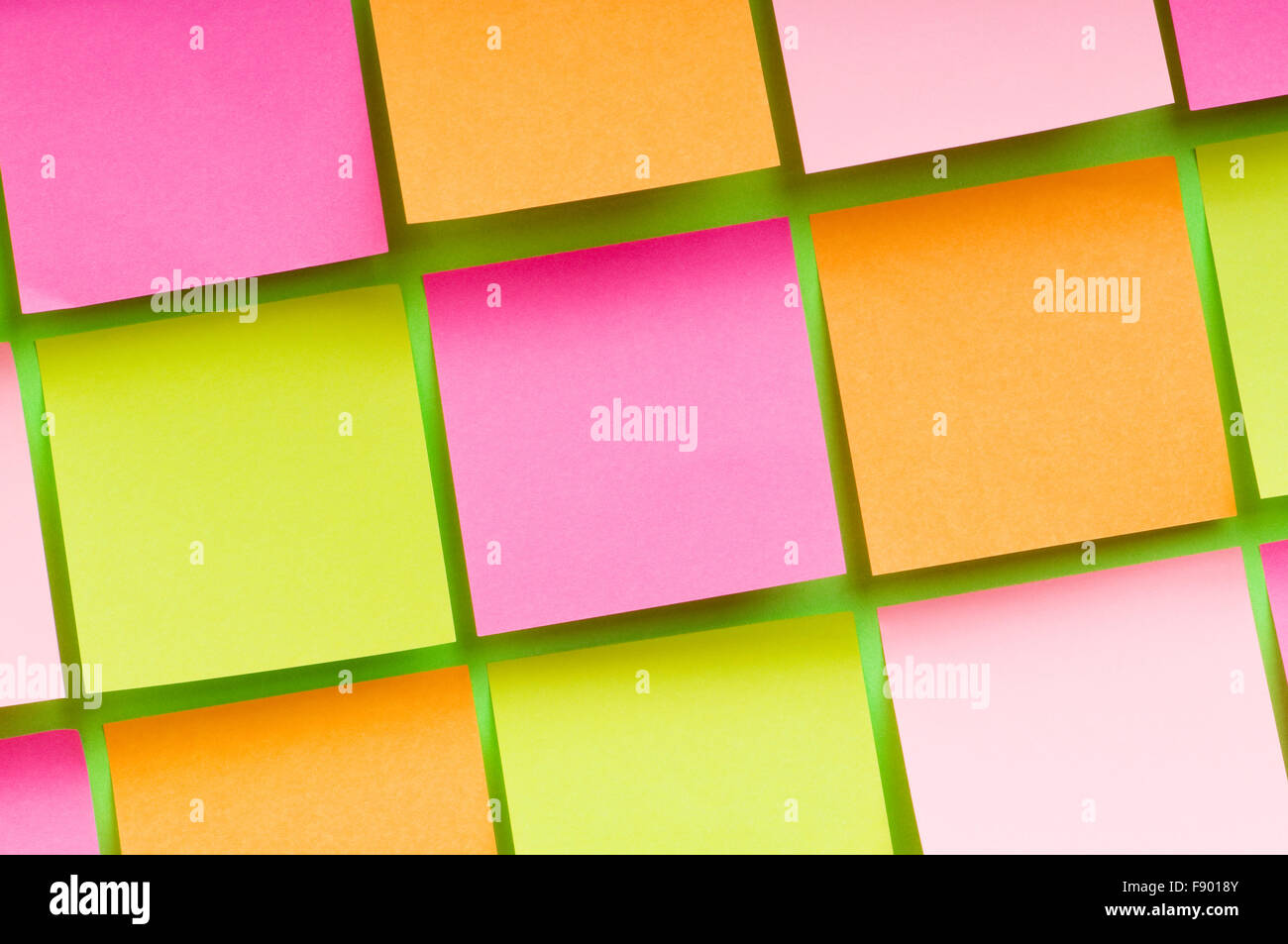 Reminder notes on the bright colorful paper Stock Photo - Alamy