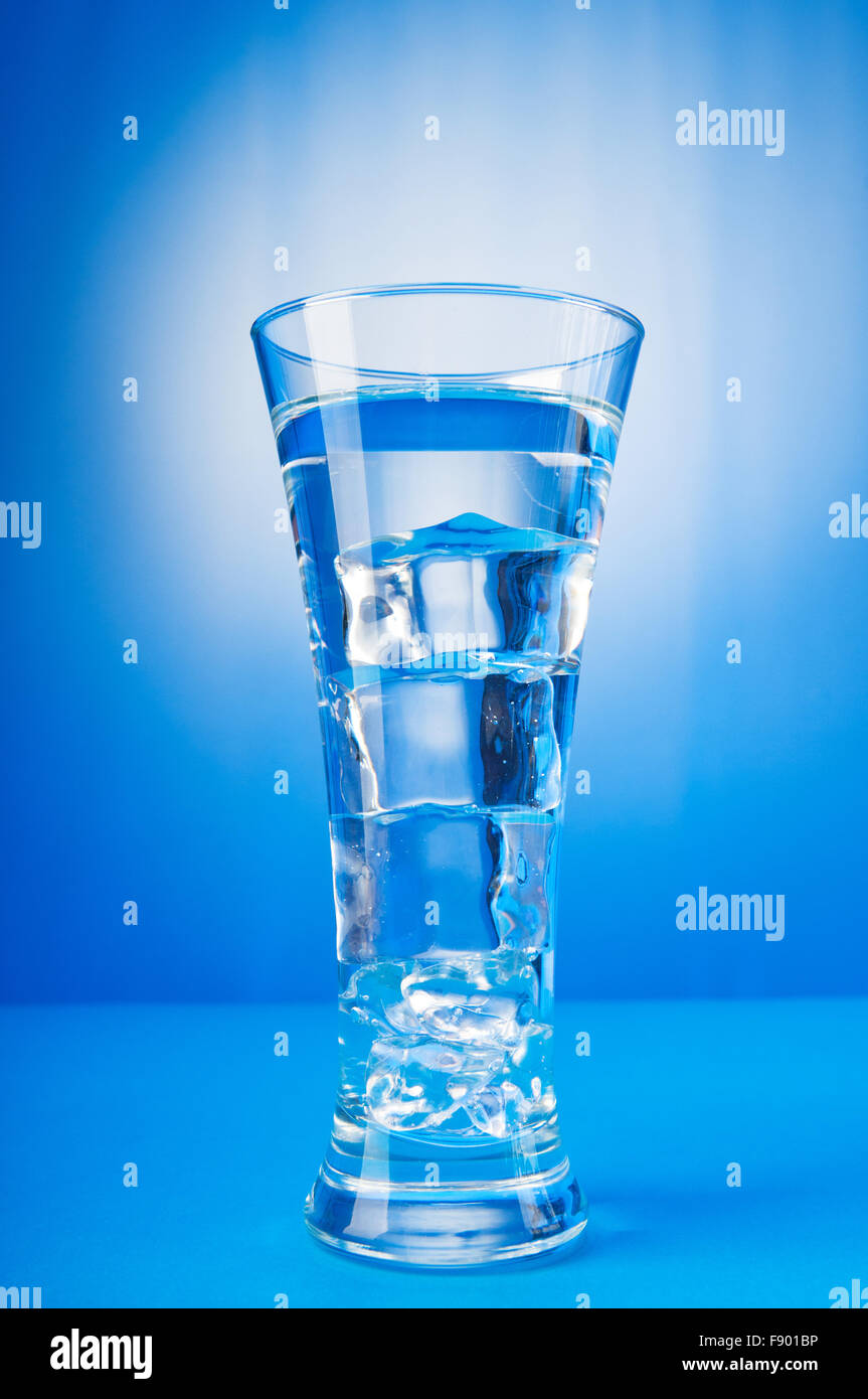 Water in the glass against gradient background Stock Photo - Alamy