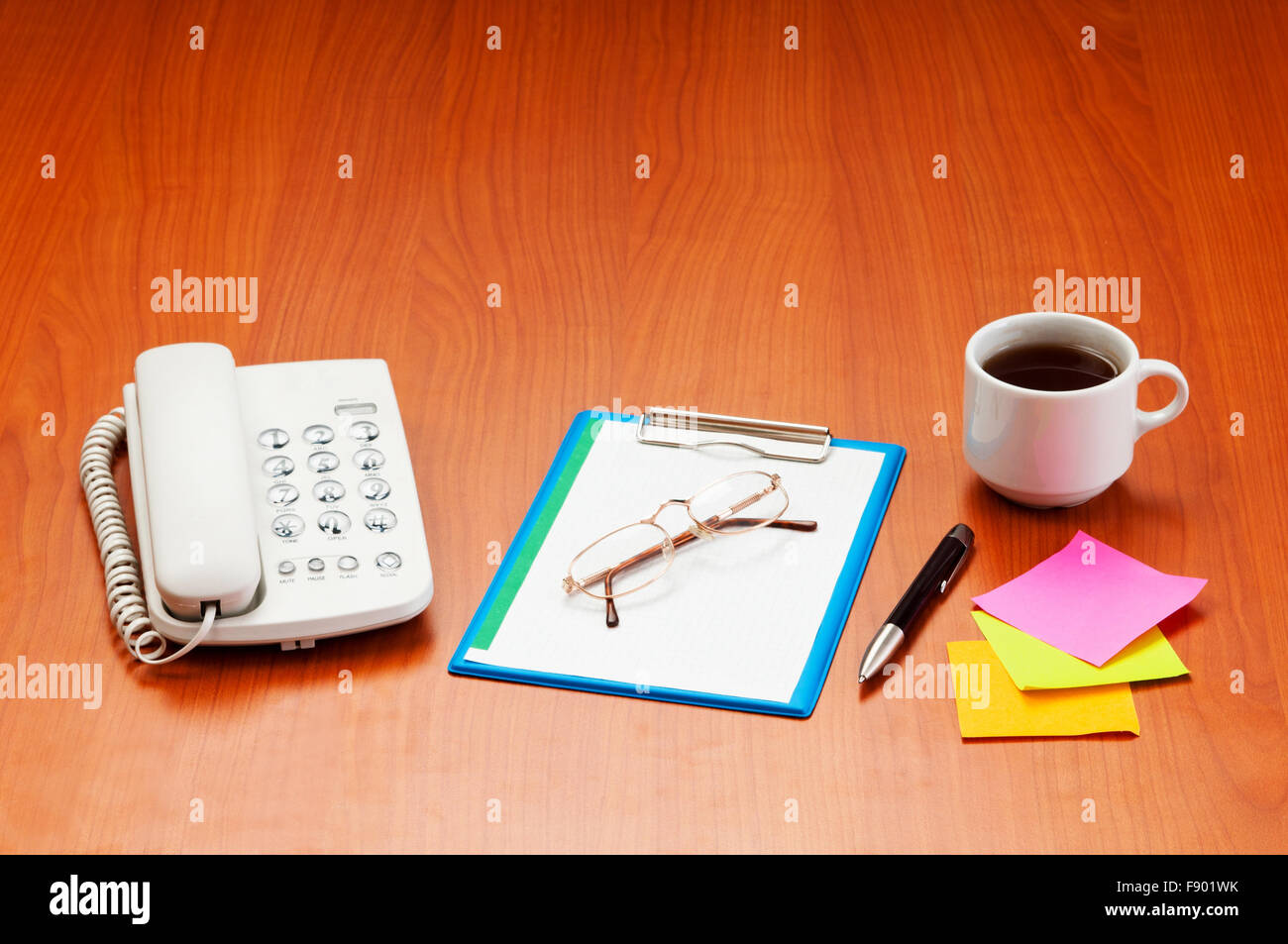 Desk top with many items Stock Photo - Alamy