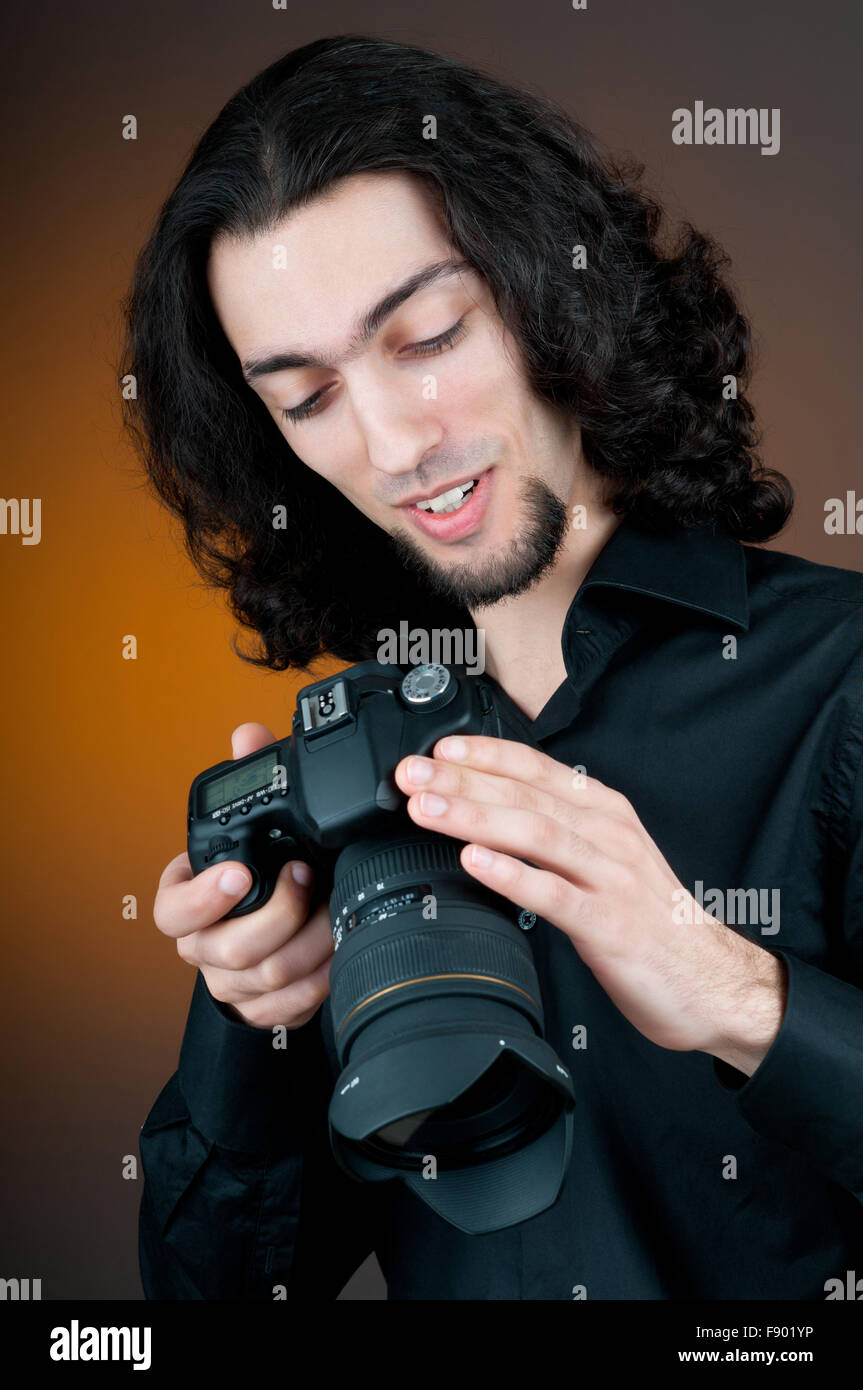 Photographer with the digital camera Stock Photo - Alamy