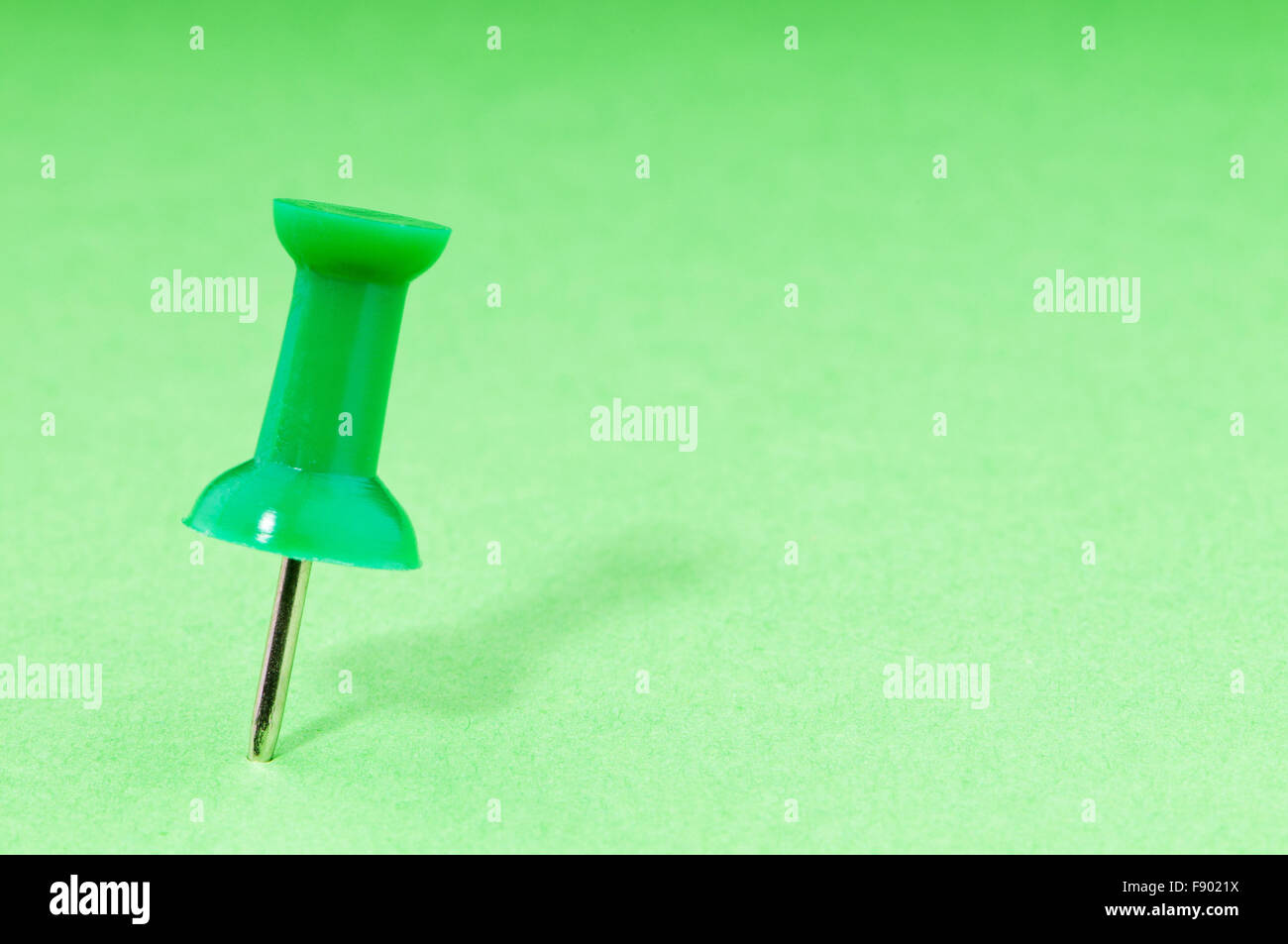 Office pins on the paper Stock Photo - Alamy