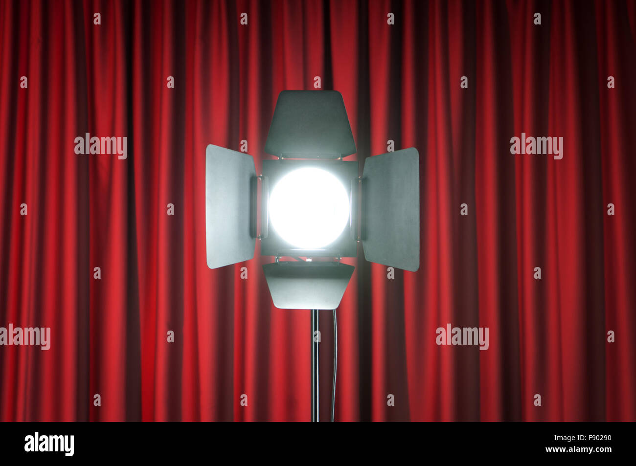 Curtains and projector lights wtih space for your text Stock Photo - Alamy