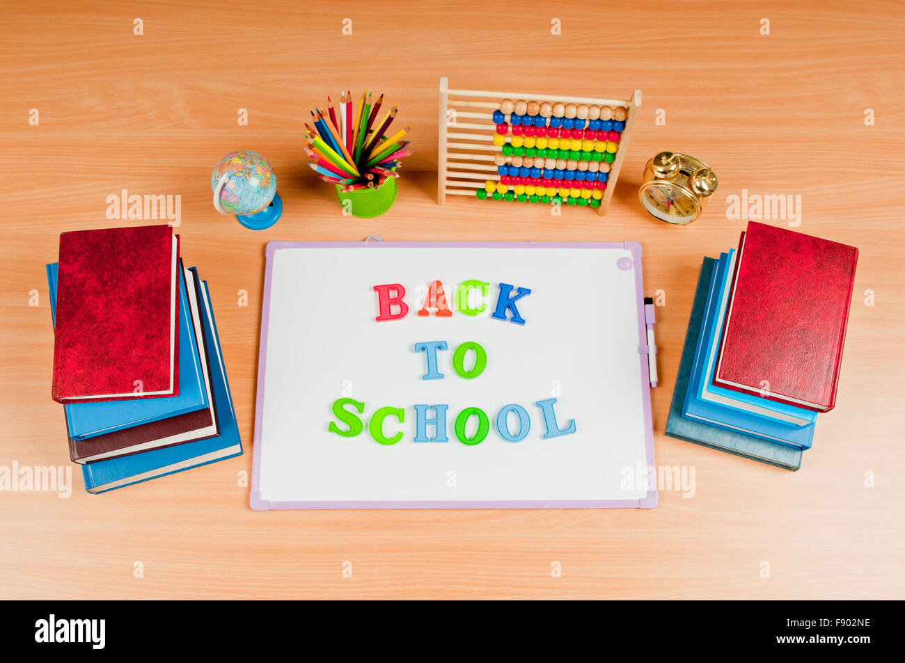 School items on the desk Stock Photo - Alamy