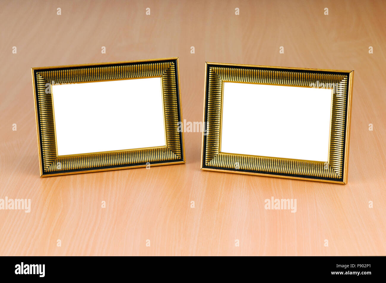Photo frames on the table Stock Photo - Alamy