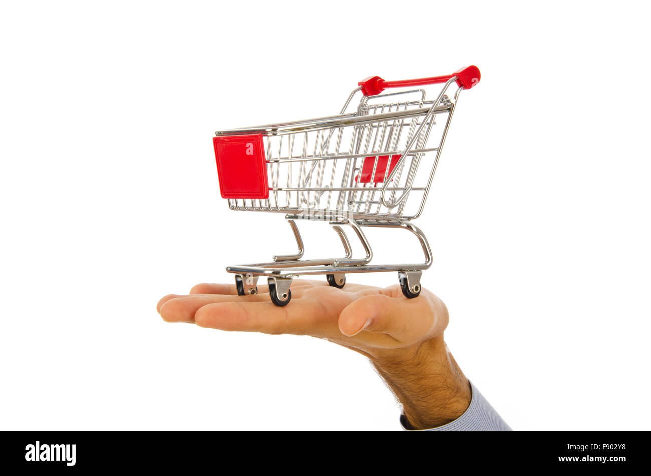 Hand holding shopping cart on white Stock Photo - Alamy