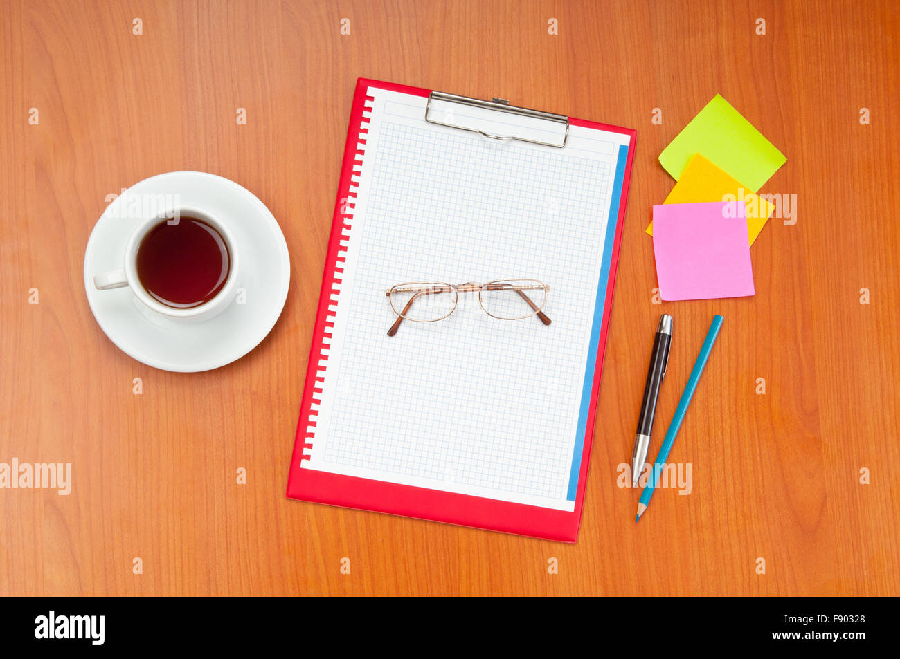 Desk top with many items Stock Photo - Alamy